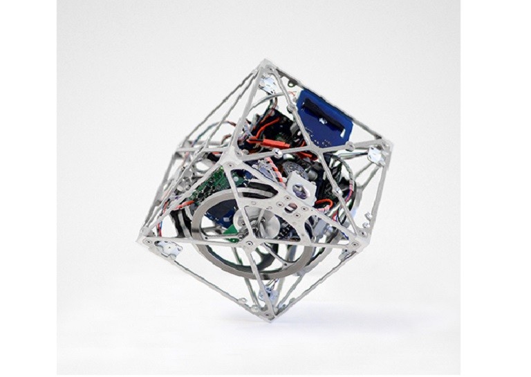 The Cubli: A Cube that can Jump and Self-balance