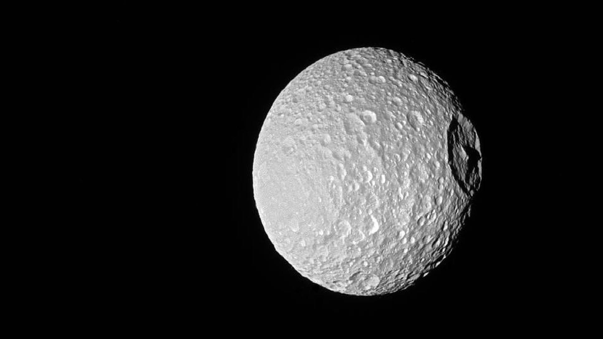 Saturn's Mimas Moon: Scientists Perplexed to Find Something Under ...
